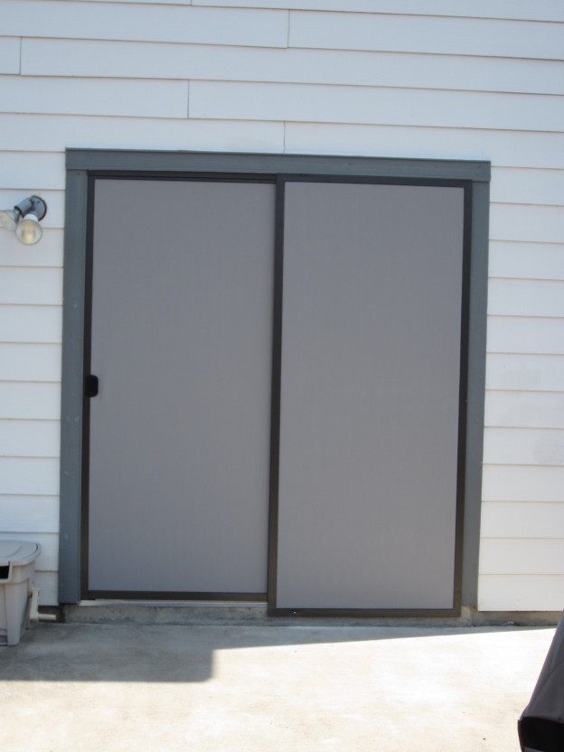 Gray fabric w/ brown frames solar window screens & sliding door screen ...